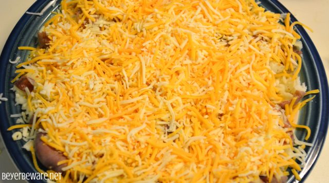 Now comes the cheese. Without cheese, you can't have a loaded baked ...