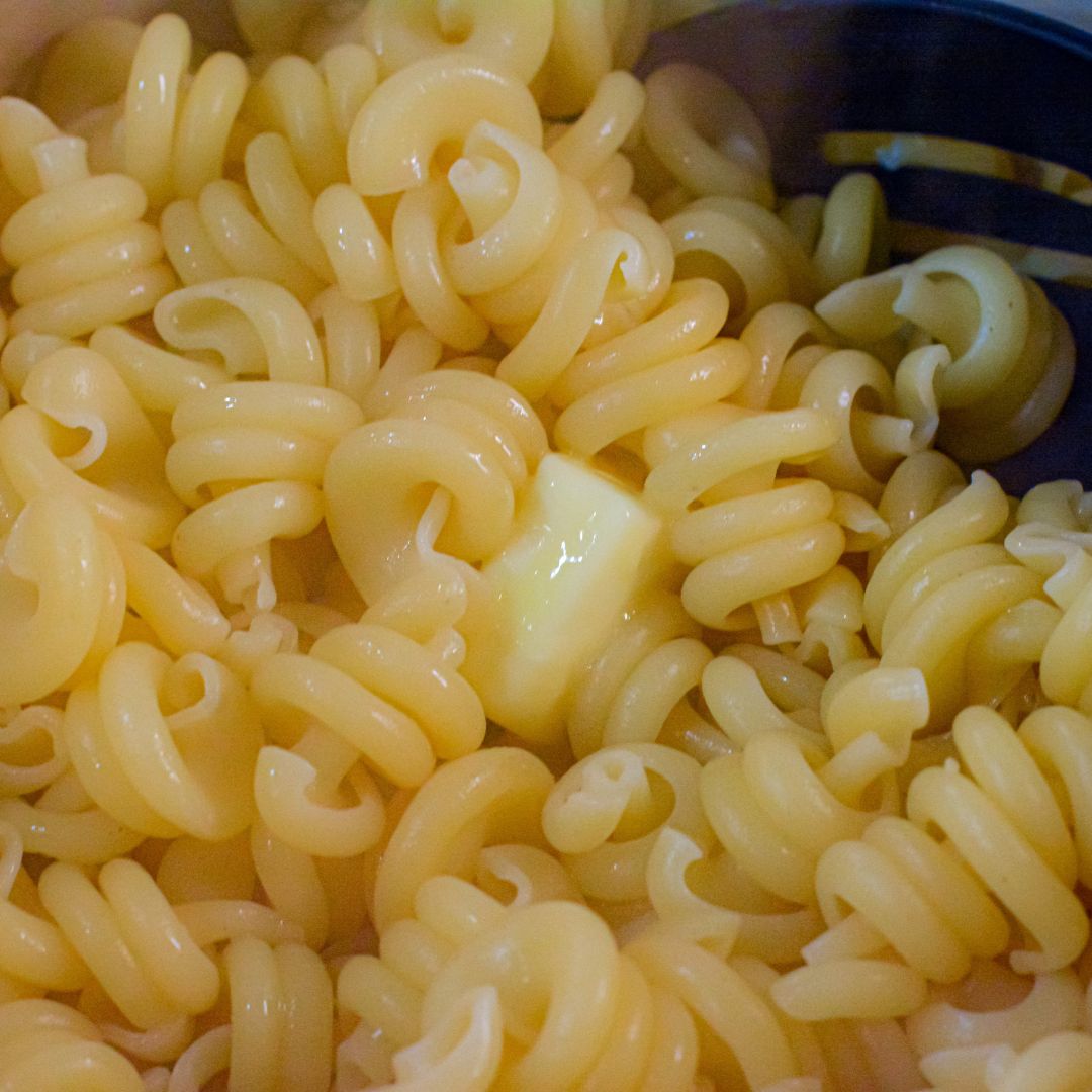Begin by bringing a Dutch oven filled with water to boil. Then begin ...
